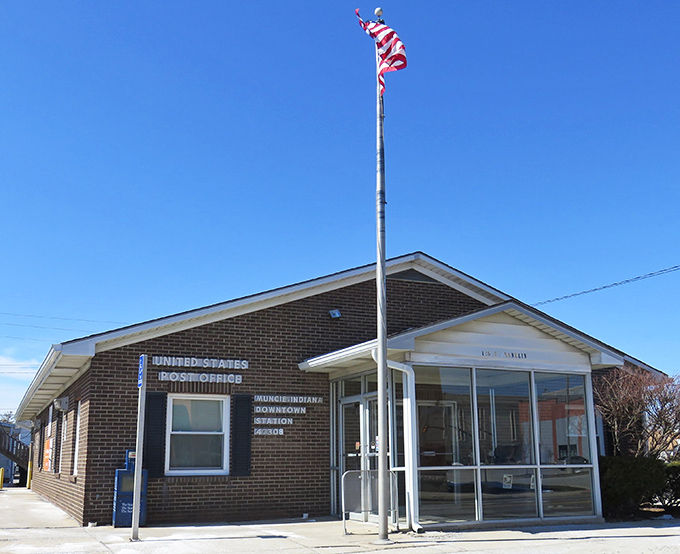 Even Muncie's post office has that small-town charm where the flag stands tall and nobody minds if you take an extra minute with forms.