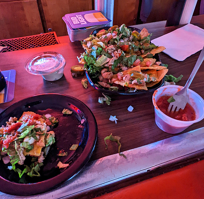 These nachos aren't just a appetizer&mdash;they're a technicolor fiesta of flavors that somehow manages to stay crispy despite its mountain of toppings.