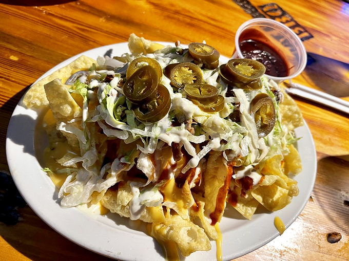 Nachos loaded with enough toppings to feed a small army or one very hungry person.
