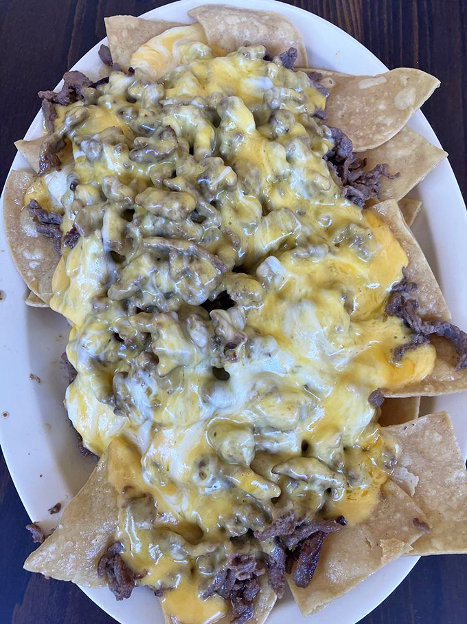 These nachos aren't playing around&mdash;they've committed to a serious relationship with cheese and green chile that would make lesser chips crumble under pressure.