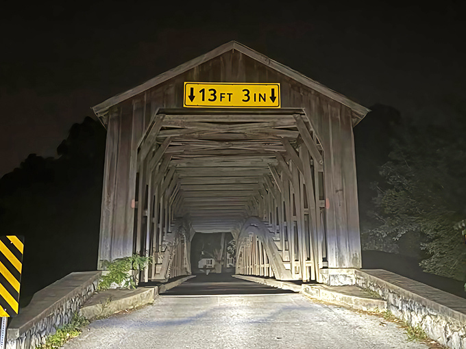 As darkness falls, the bridge becomes even more mysterious&mdash;its illuminated tunnel beckoning night travelers like a portal to another time.