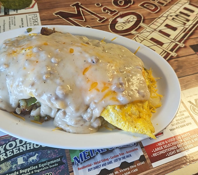This omelet didn't just get covered in sausage gravy&mdash;it got smothered with the kind of affection only small-town diners truly understand.