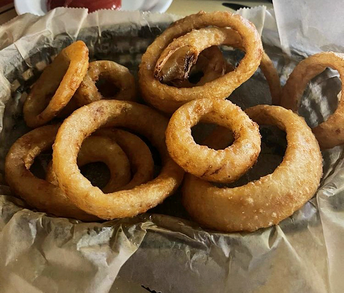 Onion rings that deserve their own fan club &ndash; golden hoops of perfectly fried deliciousness that make you wonder why you ever settled for lesser versions.