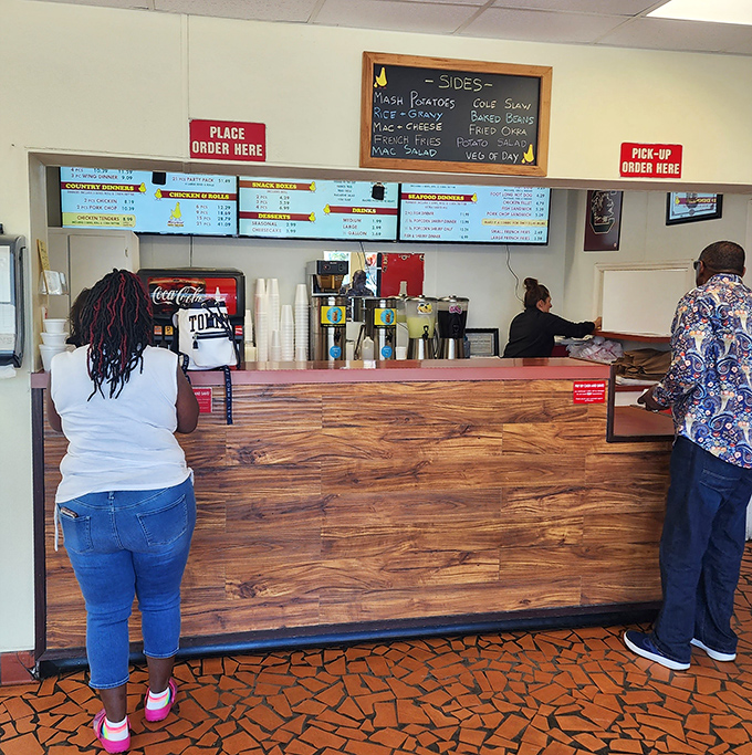 The wooden counter where magic happens&mdash;place your order here and prepare for a religious experience in fried form.