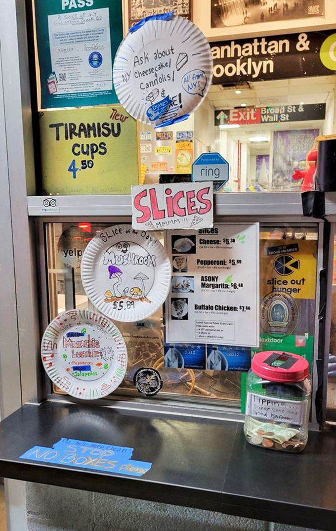 Paper plates with personality tell the story of customer creativity. When your pizza is this good, even the ordering window becomes an art gallery.