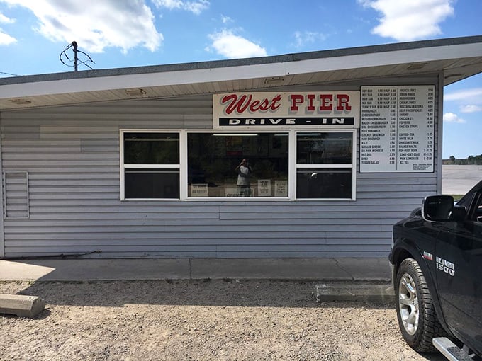 The ordering window: where dreams are shared and burger wishes granted by the keepers of the flame-grilled secrets.
