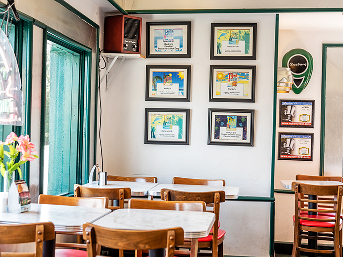 Awards line the walls like badges of honor, telling the story of a place that's earned its reputation one perfectly grilled burger at a time.