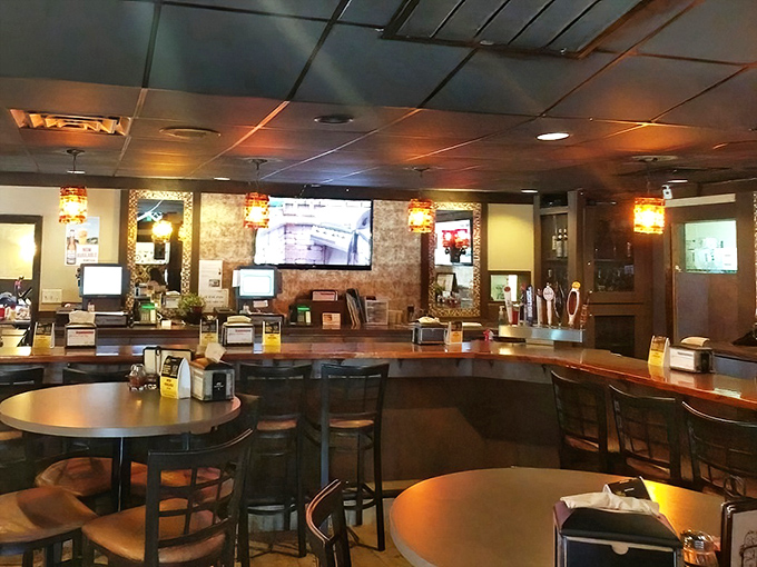The bar area strikes that perfect balance between "neighborhood watering hole" and "family restaurant" &ndash; welcoming to all who enter its wood-paneled domain.