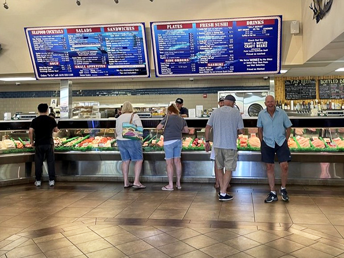 Where seafood dreams come true. Customers line up for their maritime treasures while staff work their magic behind the counter.