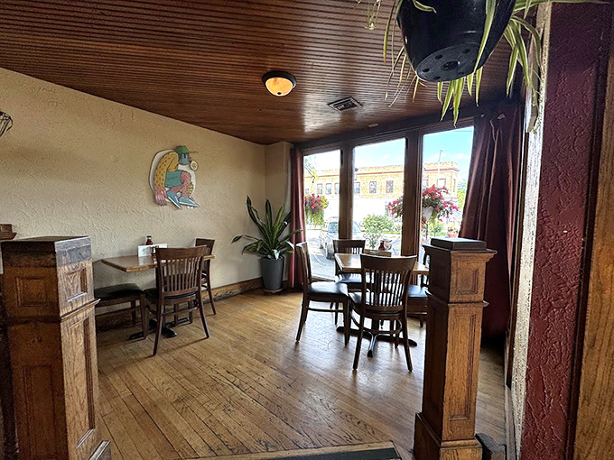 Wooden pillars frame this sunny corner where coffee conversations stretch into lunch and sometimes&mdash;magically&mdash;into dinner plans.