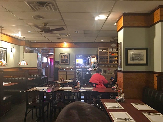 The dining room at Hickory Bar-B-Q&mdash;where conversations flow as freely as the iced tea. No Edison bulbs necessary when you've got genuine atmosphere. 