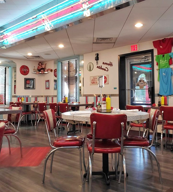 Red vinyl chairs and speckled tables create the perfect backdrop for conversations that flow as freely as the coffee refills.