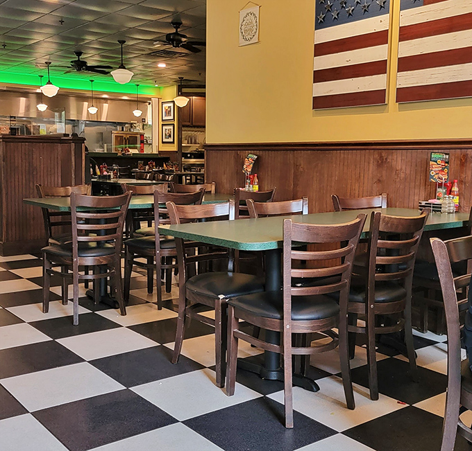 American flag on the wall, classic wooden wainscoting, and ceiling fans that have witnessed countless food epiphanies. Norman Rockwell would approve.