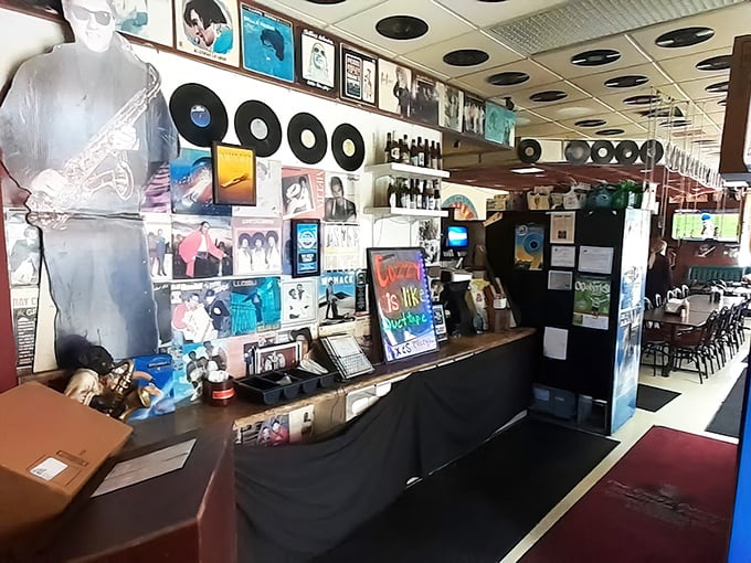 Album covers and vinyl records line the walls, creating an atmosphere where good music and good food are equally celebrated companions.