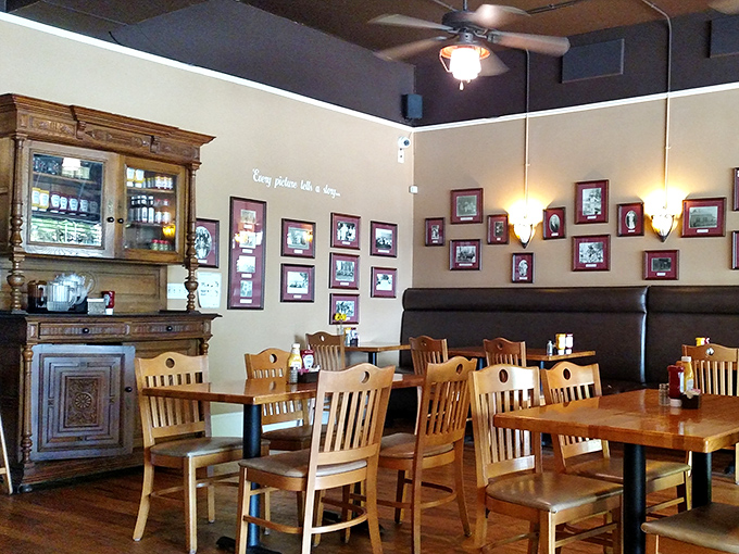 Vintage cabinets, wooden chairs, and walls adorned with framed memories&mdash;this isn't interior design, it's a community scrapbook you can dine in.