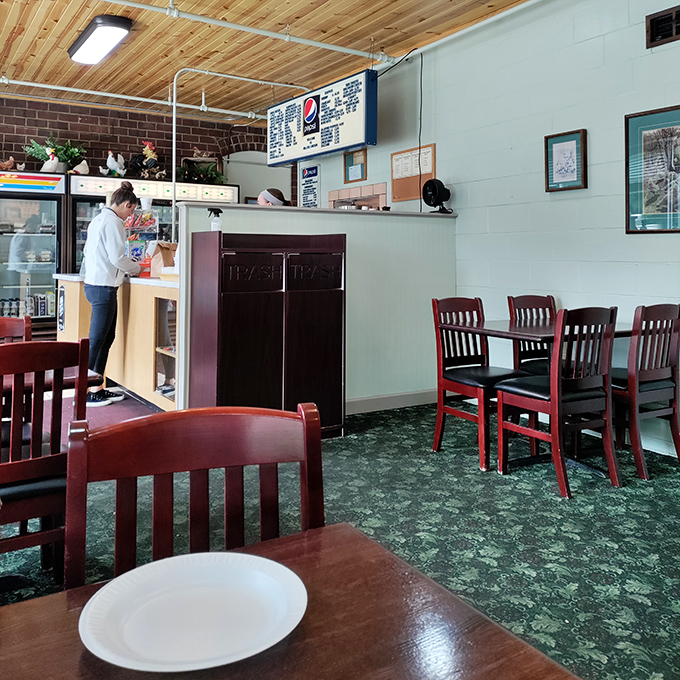 The brick wall backdrop creates a timeless setting where generations of Athens residents have satisfied their fried food cravings.