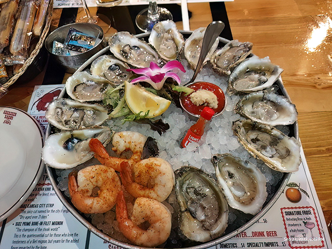 This isn't just a platter of oysters&mdash;it's Neptune's jewelry box displayed on ice. The pink orchid isn't just garnish&mdash;it's a reminder that seafood this fresh deserves a little glamour.