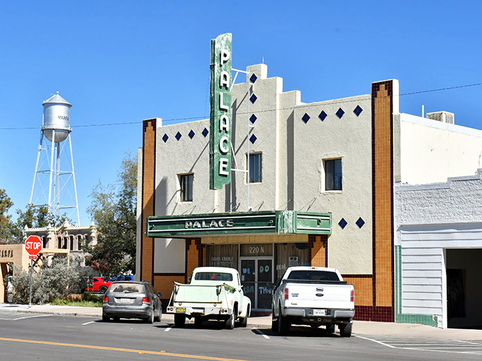 The Palace Theater's vintage marquee has witnessed decades of Marfa history, from cattle boom to art boom, with that gorgeous water tower standing guard.