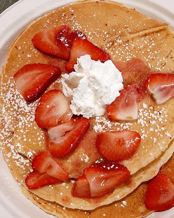 Pancakes that make you understand why breakfast is the most important meal of the day. Those strawberries aren't garnish&mdash;they're jewelry.