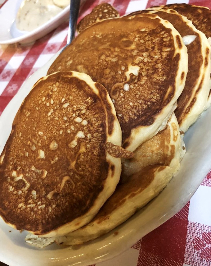 Pancakes so perfectly golden they deserve their own Instagram account. These fluffy discs of joy are what breakfast dreams are made of.