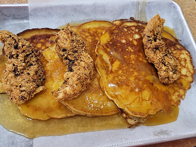 Pancakes and fried chicken together create the kind of harmony that makes breakfast dreams come true.
