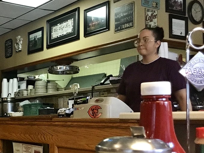 Behind the counter, where coffee flows like conversation and the real magic of Ray's happens between orders.