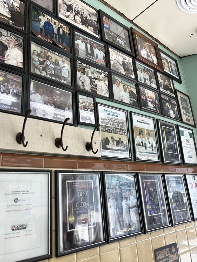 The wall of fame tells Lafayette's story better than words ever could. Each photo frame holds a chapter of Detroit history.