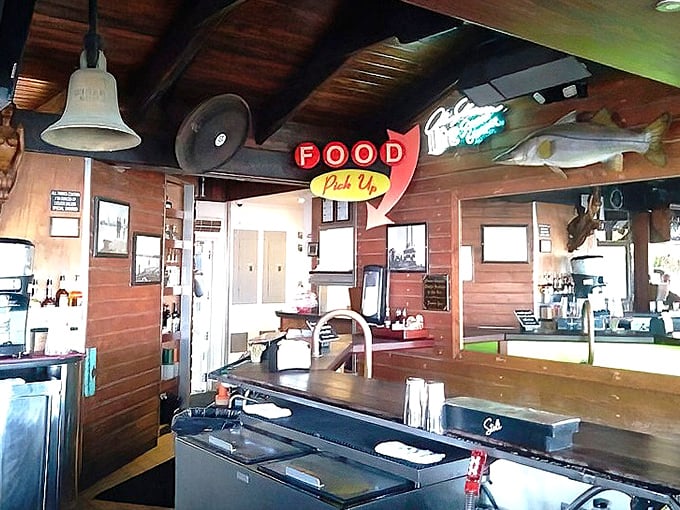 The "Food Pick Up" sign glows like a beacon of hope for hungry boaters and landlubbers alike.