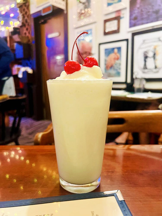 A Key lime colada topped with cherries &ndash; vacation in a glass. One sip and you'll forget all about your inbox back home.