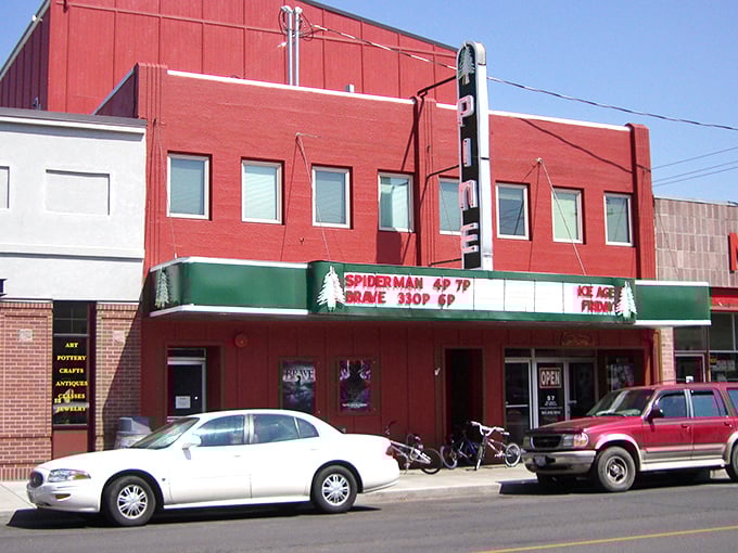 The Pine Theater's classic marquee promises entertainment the old-fashioned way&mdash;no algorithms suggesting what to watch, just community gathering for shared stories.