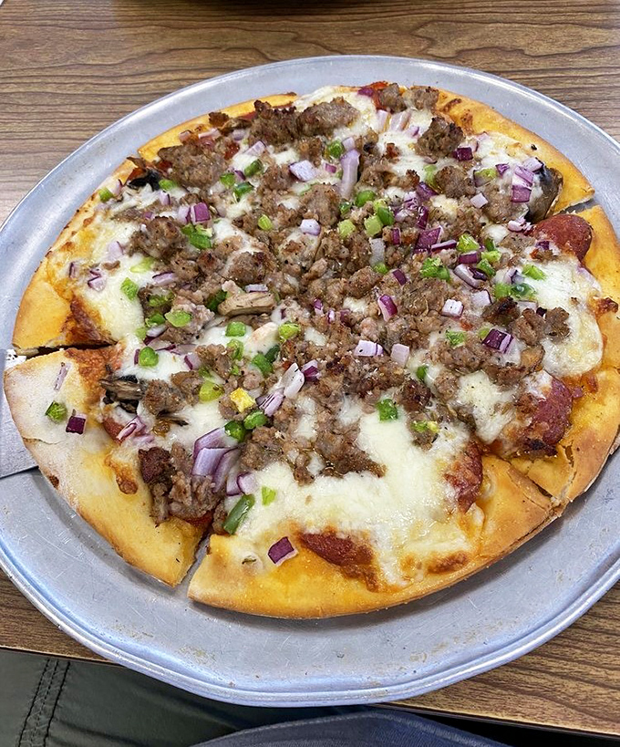 Pizza that doesn't need a fancy wood-fired oven or imported flour &ndash; just honest toppings generously applied by people who care.