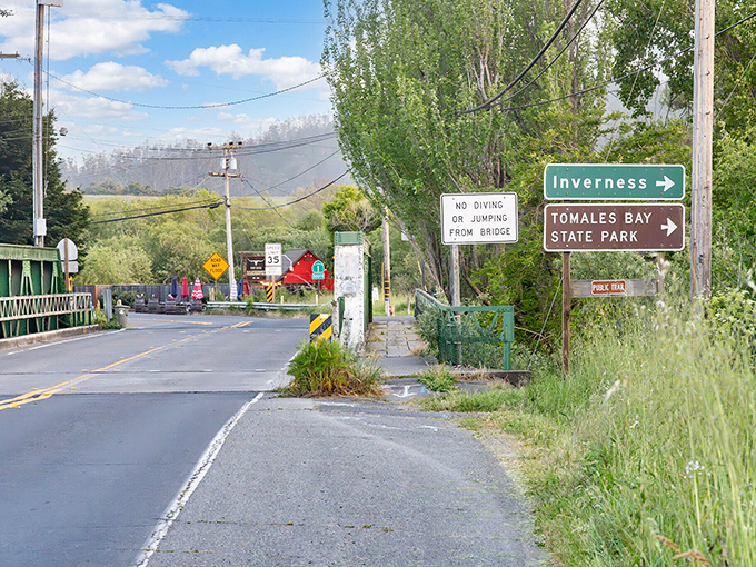 Road signs pointing to paradise&mdash;where "rush hour" means the dinner line at the local oyster shack.