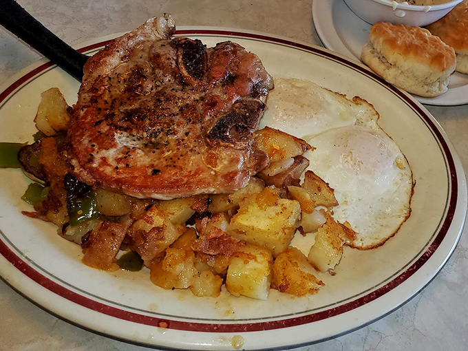 The pork chop and eggs plate that answers the eternal question: "Why choose between breakfast and dinner?"