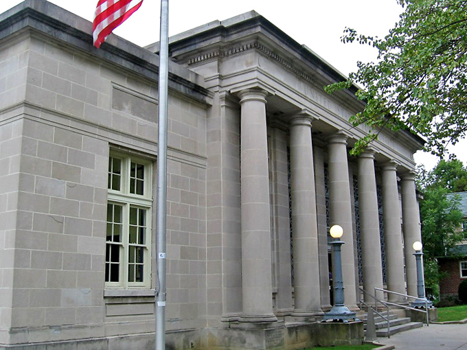 Classical columns frame this stately building like bookends holding centuries of American stories and civic pride together.