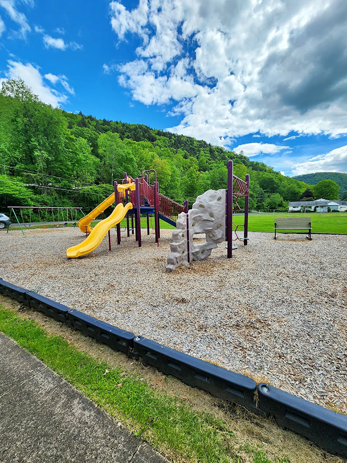 Local playgrounds come with mountain backdrops that theme parks spend millions trying to replicate. Here, it's just the natural setting for childhood memories.