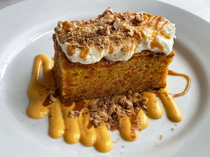 This isn't just pumpkin cake&mdash;it's autumn on a plate, with caramel drizzles and whipped cream that would make a pumpkin spice latte jealous.