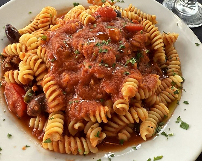 Pasta puttanesca with a sauce so robust and flavorful, you'll want to write sonnets about its tomato-y perfection.