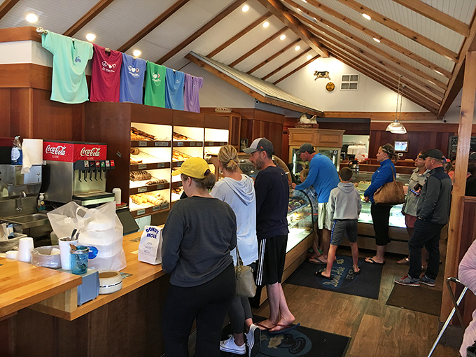 The line forms early, but patience is rewarded with pastry perfection. These folks know that good things come to those who wait.