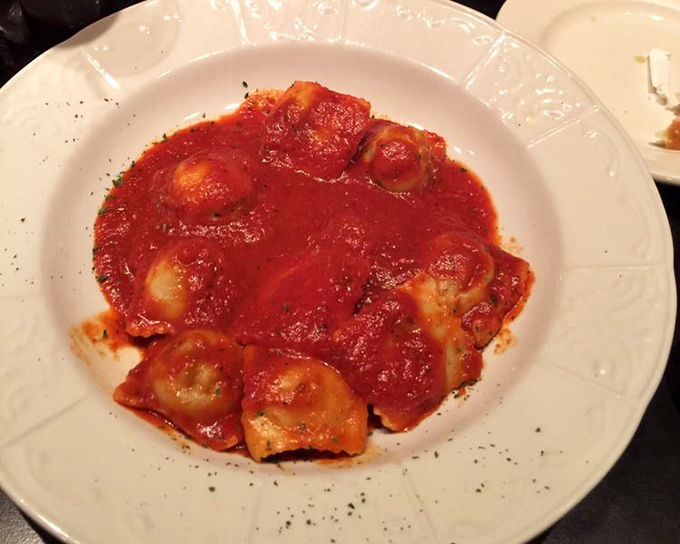 Ravioli swimming in marinara like little pasta pillows taking a delicious spa day &ndash; each bite a reminder of why Italian food conquered the world. 
