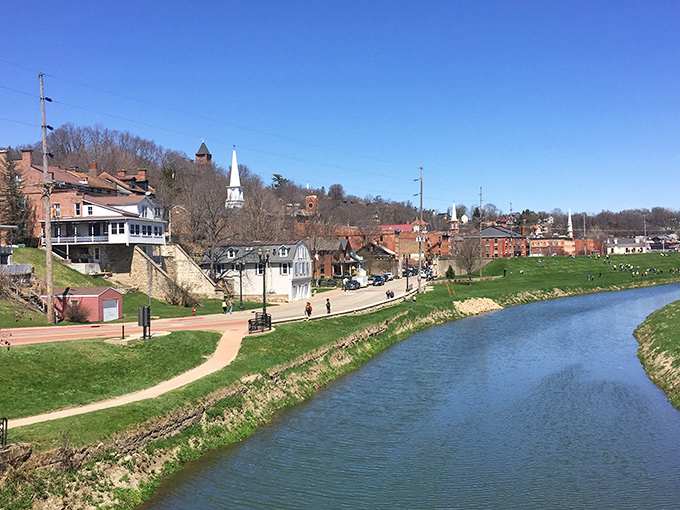 The Galena River curves gently alongside historic buildings, a reminder that waterways were the original highways before we paved paradise.