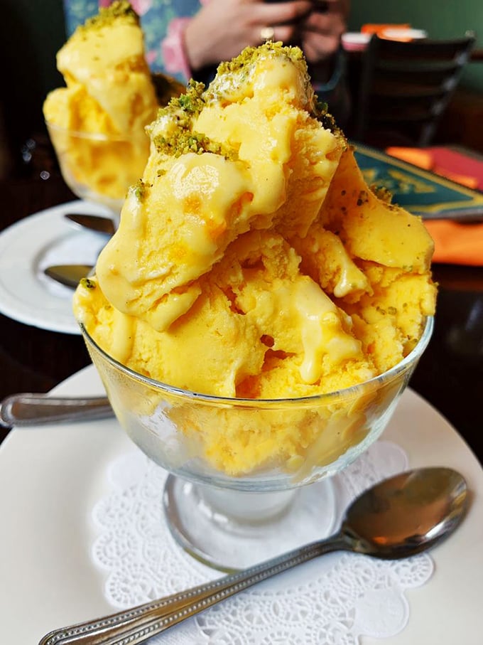 Saffron ice cream arrives like sunshine in a bowl, proving dessert can be both exotic and comforting.