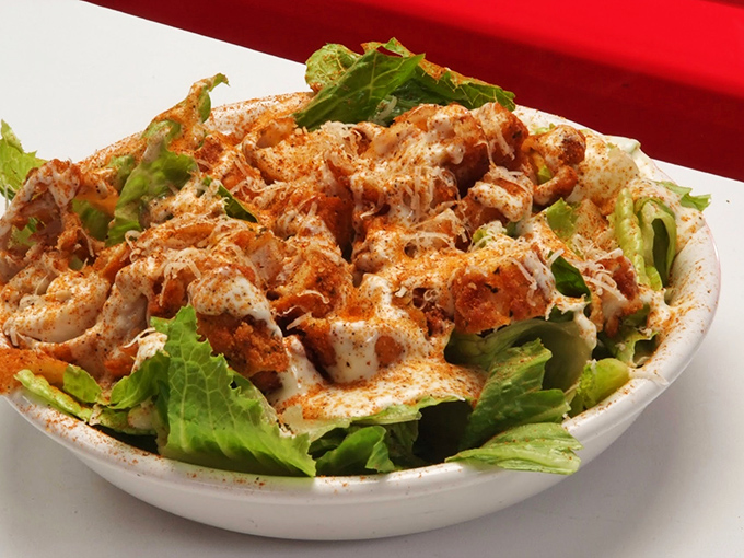 Even the salads at Nifty Fifty's understand that moderation is overrated. That's not a side dish&mdash;it's a celebration with lettuce.