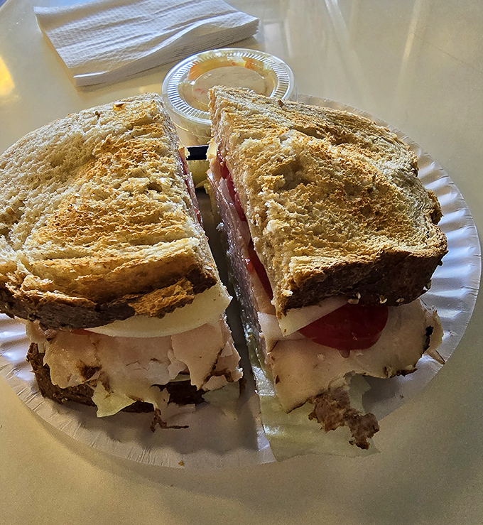 A sandwich so perfectly constructed it could teach architecture students a thing or two about structural integrity and the beauty of simplicity.