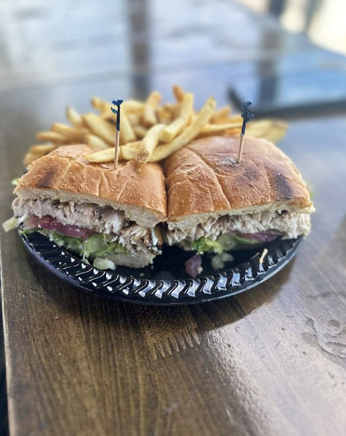A sandwich so stuffed with fresh fish it's practically bursting at the seams, like your uncle after Thanksgiving dinner.