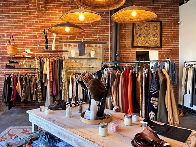 Warm lighting and exposed brick create the perfect backdrop for clothing that ranges from everyday essentials to statement pieces.