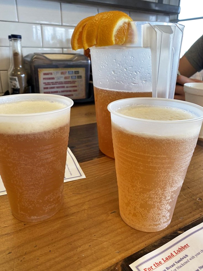Nothing complements seafood like an ice-cold pitcher with orange slices. It's practically a Florida law at this point.