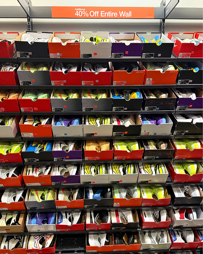 The Nike clearance wall&mdash;a magnificent monument to athletic aspirations where wallets and workout goals find happy compromise.
