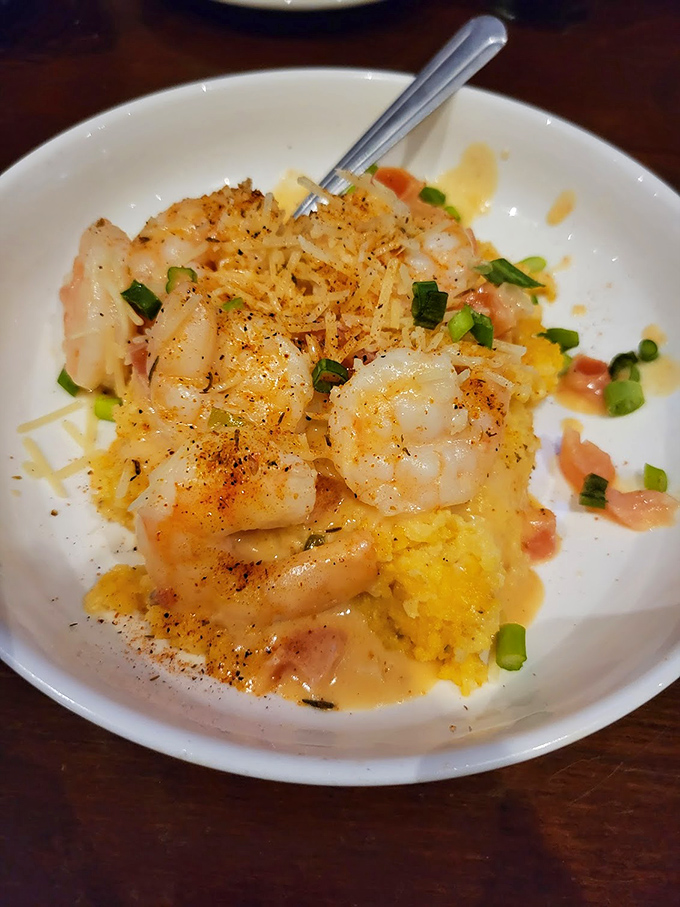 Shrimp and grits that would make a Lowcountry grandmother nod in approval&mdash;creamy, cheesy, and topped with perfectly seasoned crustaceans.