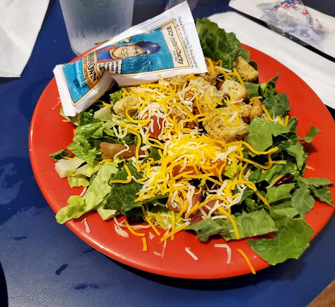 A salad that doesn't apologize for being a salad, brightened with cheese and grilled protein&mdash;the kind that makes you forget you're eating healthy.