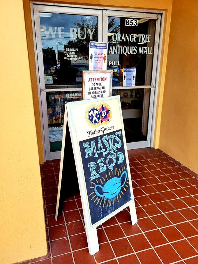 The entrance tells you everything you need to know: they buy treasures, and during pandemic times, masks were required. History in real-time.